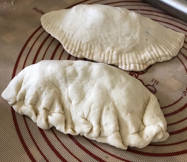 People Eating Calzones